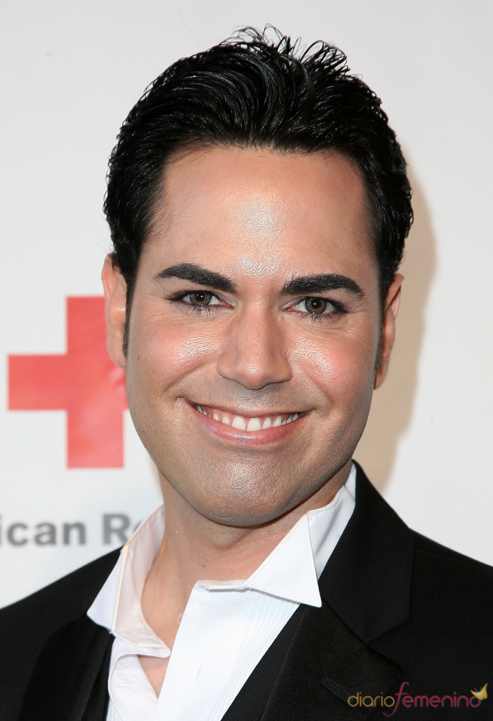 Scott Vincent posa en la gala 2011 de la Cruz Roja Americana