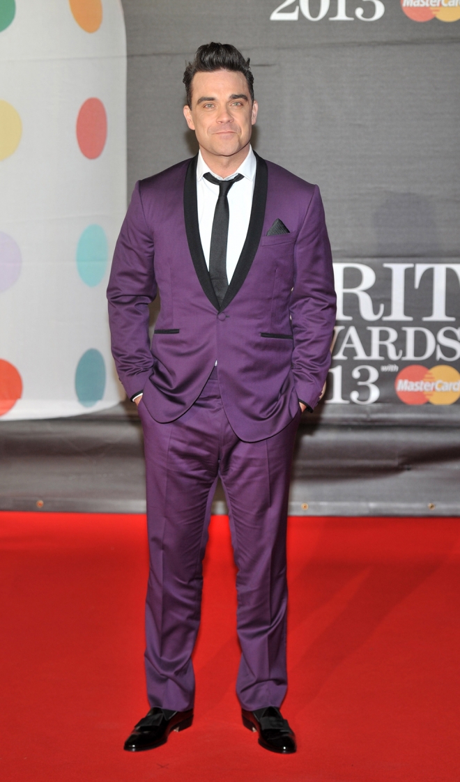 Robbie Williams, encantado con sus trajes coloridos