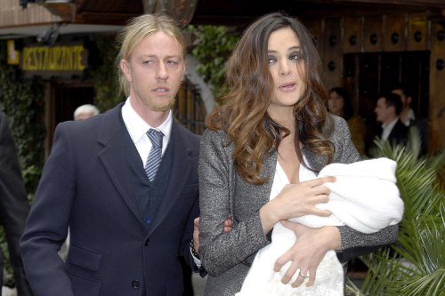 Romina Belluscio y Guti en el bautizo de su hijo